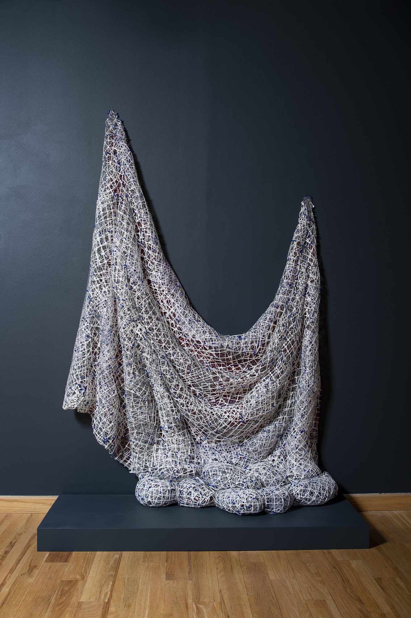 White_Red_Drip_Drape_Front - Voyage Chicago | Chicago City Guide